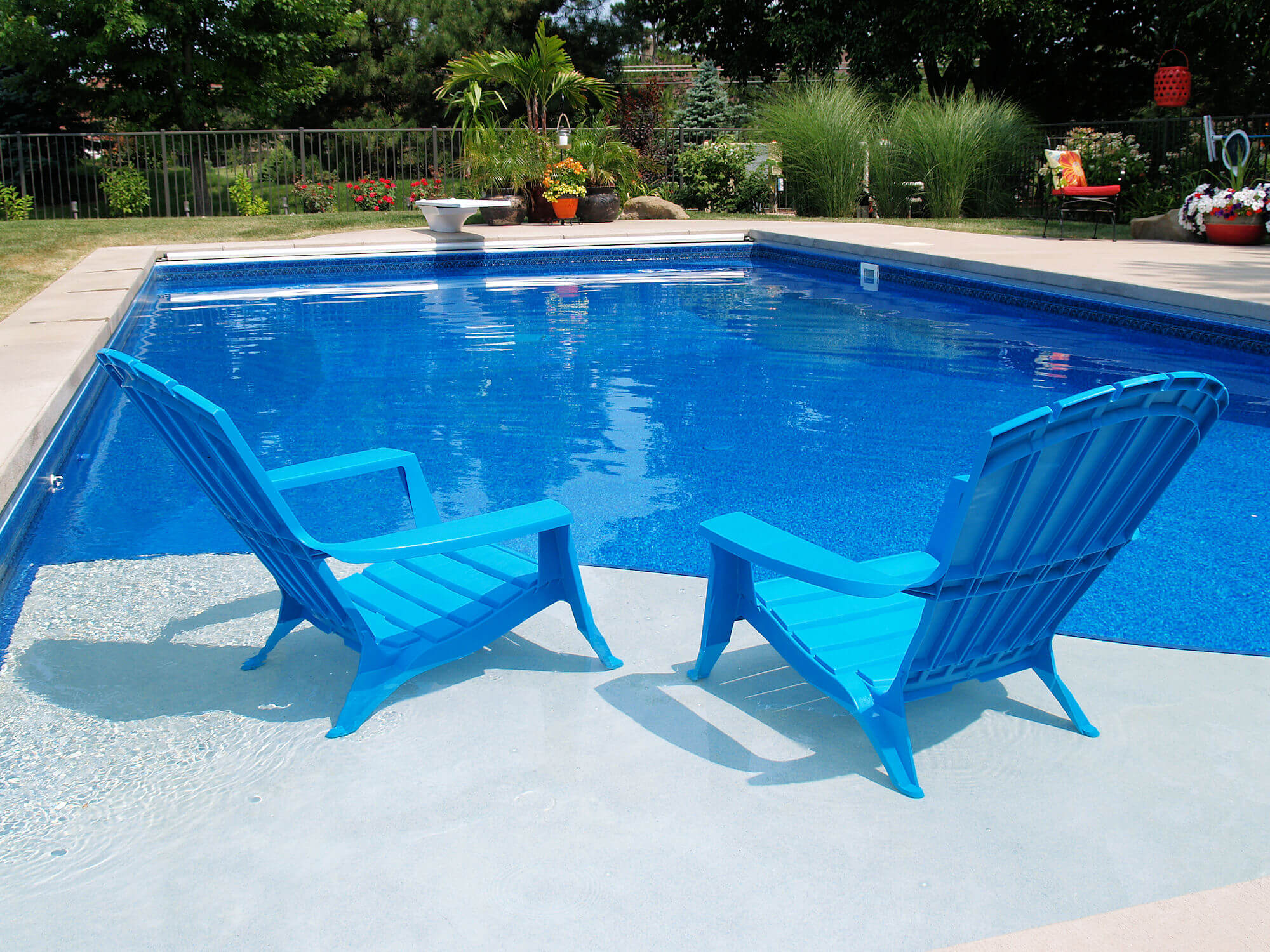 Sunbathing on a custom swim platform. (69) - Arvidson Pools and Spas