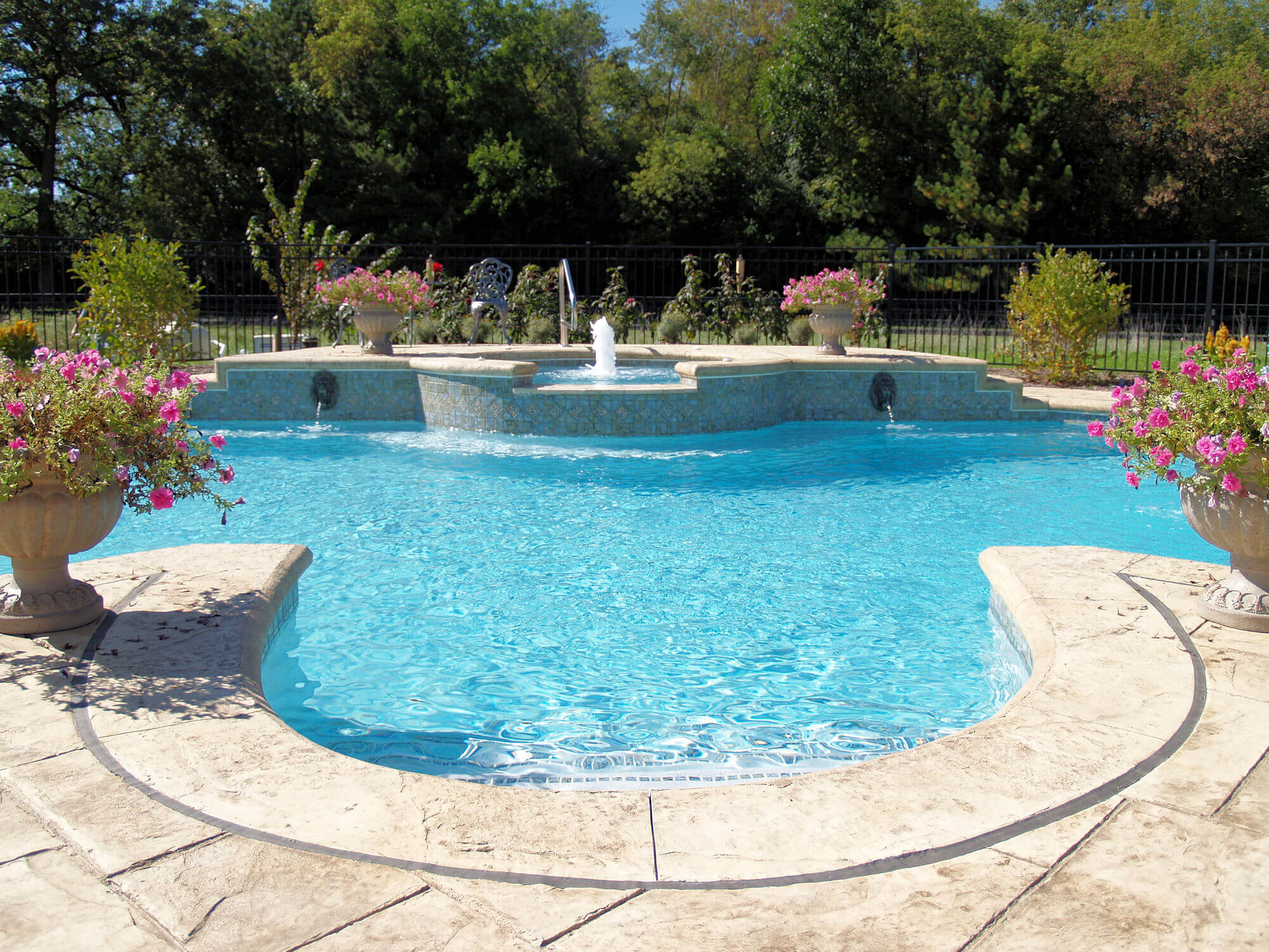 Circular design elements add beauty and grace to this pool design. (68 ...