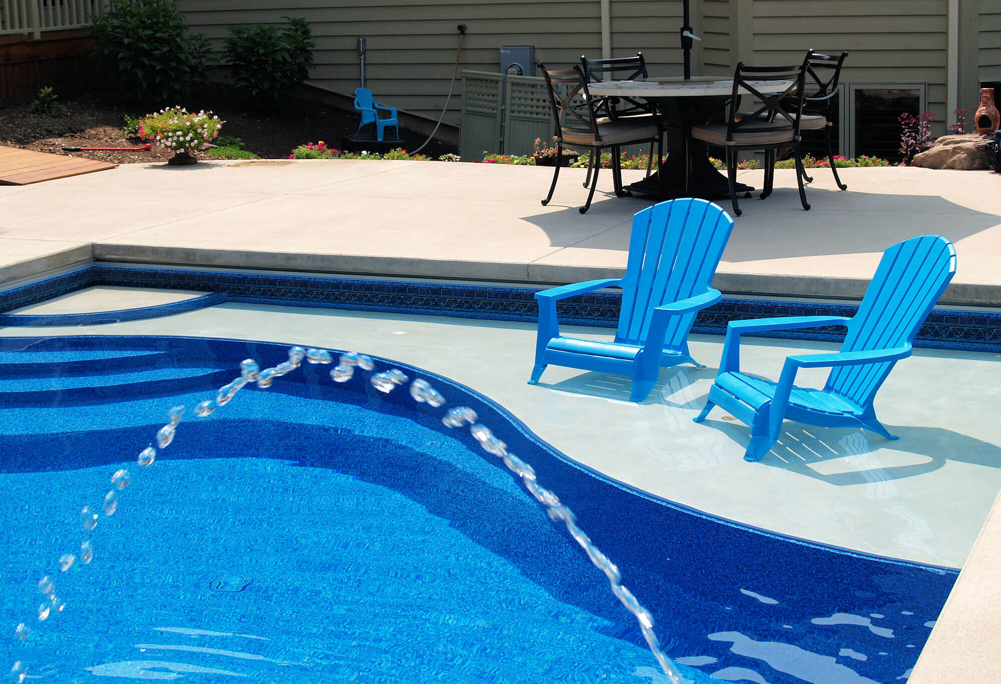 Custom Swim Platform and Water Feature. (85) - Arvidson Pools and Spas