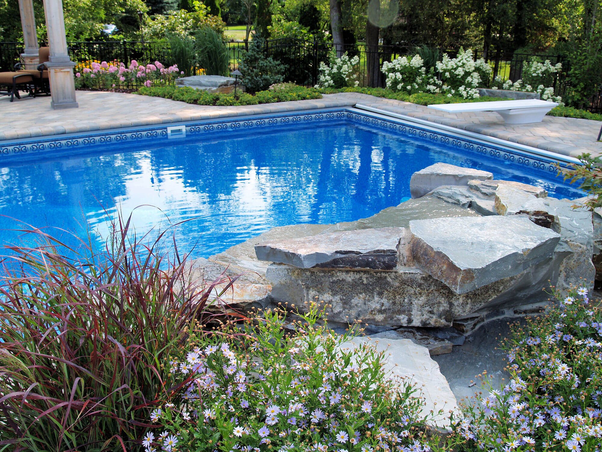 Custom landscaping creates beauty. (80) - Arvidson Pools and Spas