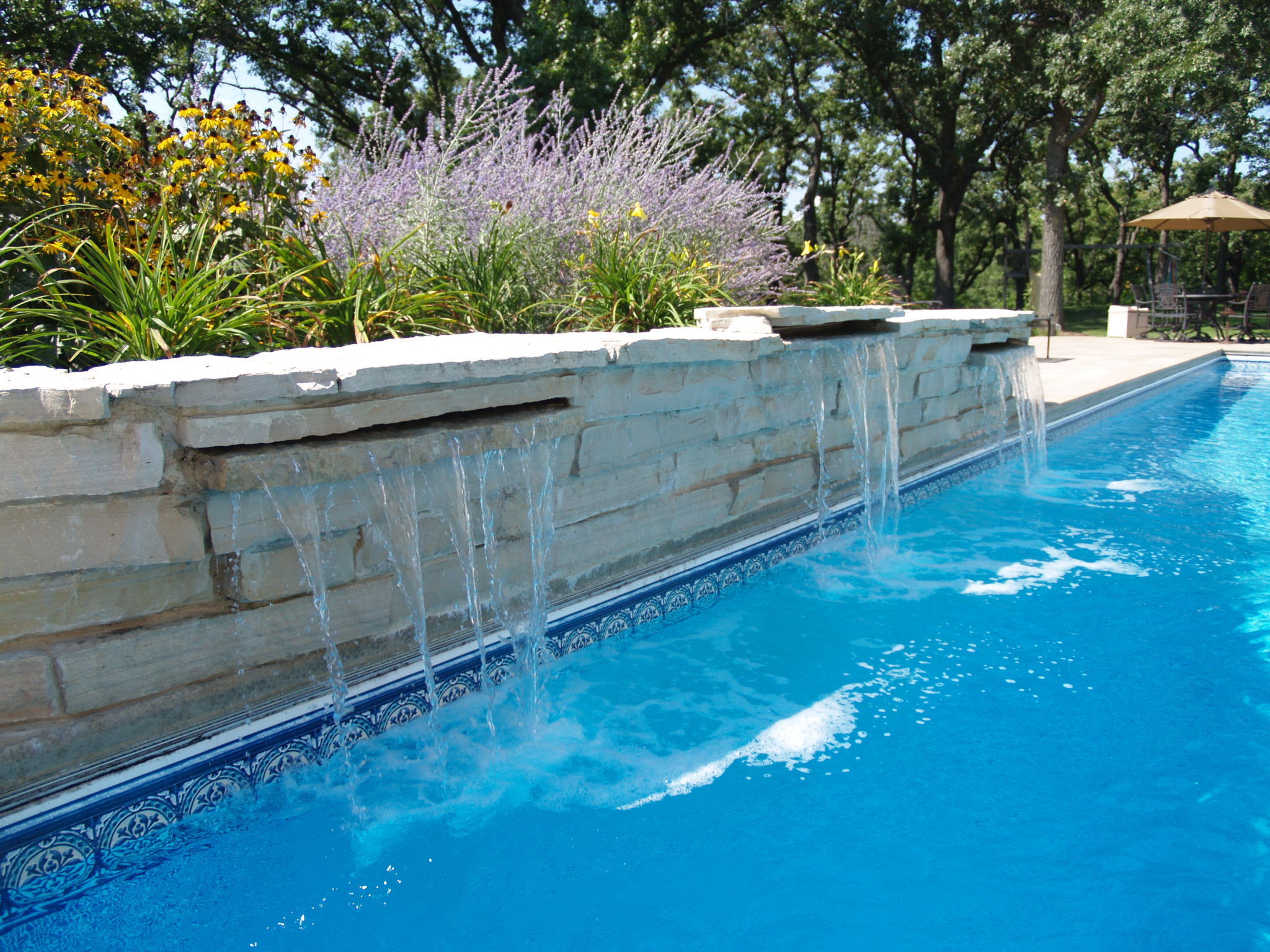Softly falling water creates a peaceful ambience. (57) - Arvidson Pools ...